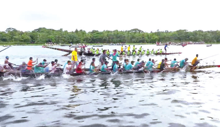 A traditional boat race (Nouka Baich) was held in the Borni Baor under ...