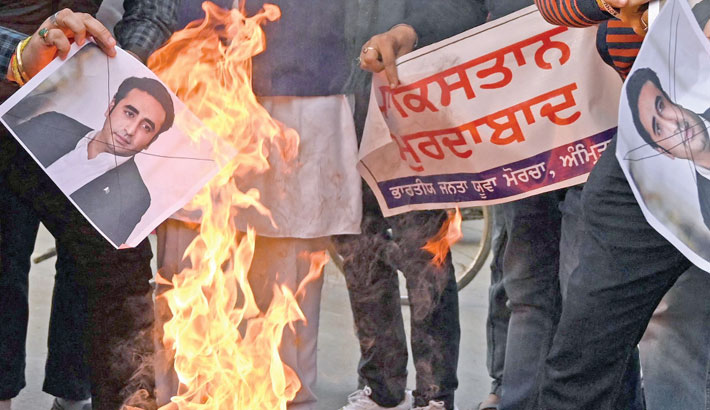 Activists from Bharatiya Janata Yuva Morcha (BJYM) shout slogans as ...