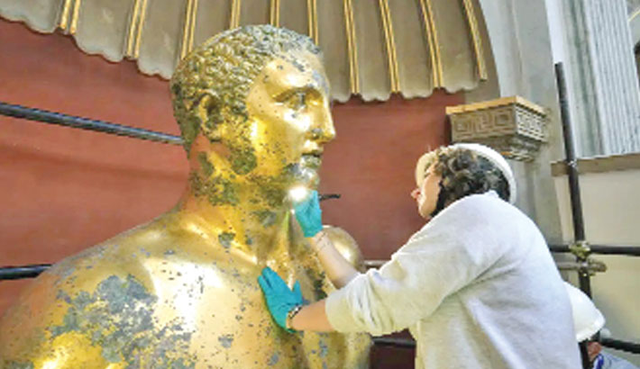 Vatican experts uncovering gilded glory of Hercules statue struck by ...