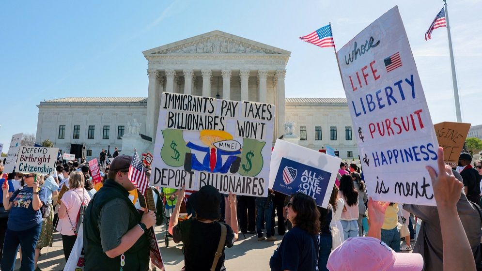 In historic first, Trump attends Supreme Court arguments