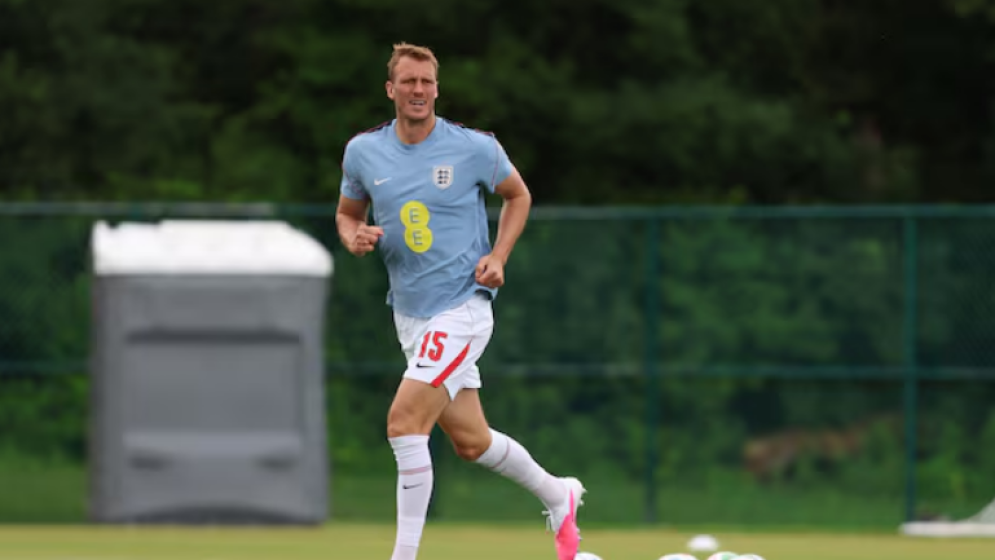 Burn swaps football boots for cowboy boots