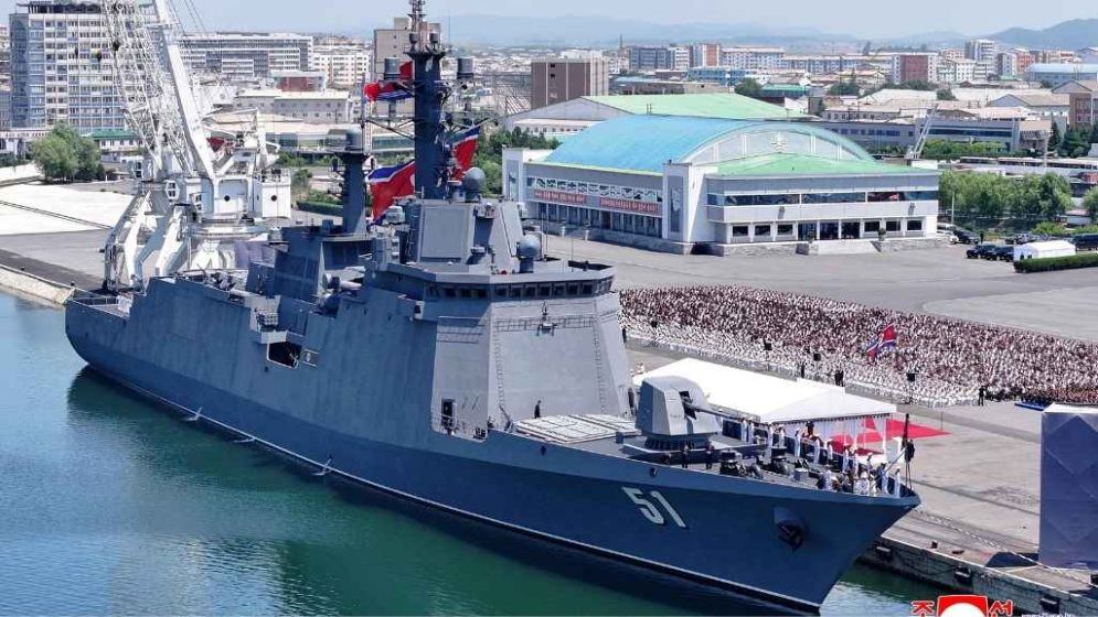 North Korea's Kim unveils plans for 10,000-tonne warships, nuclear navy